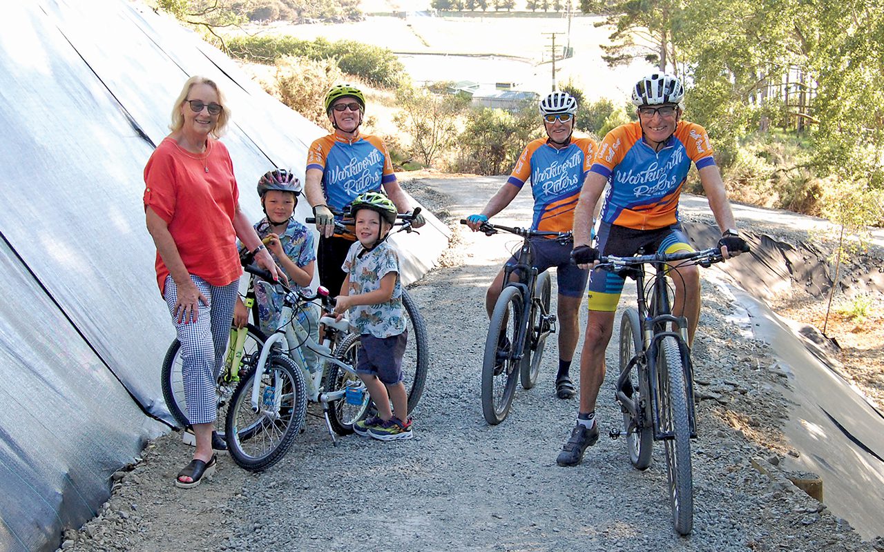 Community volunteers fix hazardous bike trail hill - Local Matters